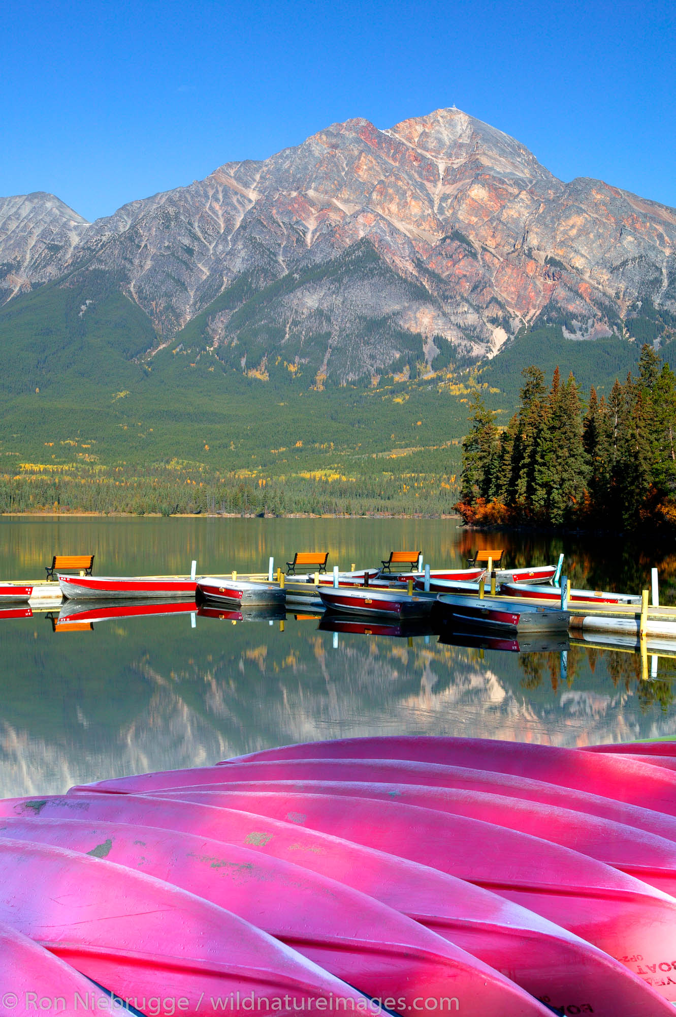 Canoes along the shore of Pyramid Lake | Jasper National Park, Alberta ...